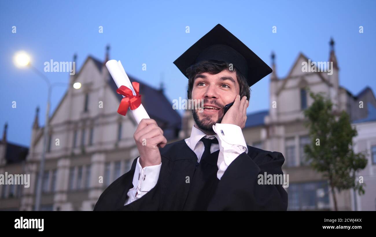 Graduation: Happy Student Calling Friends After Graduation Stock Photo ...