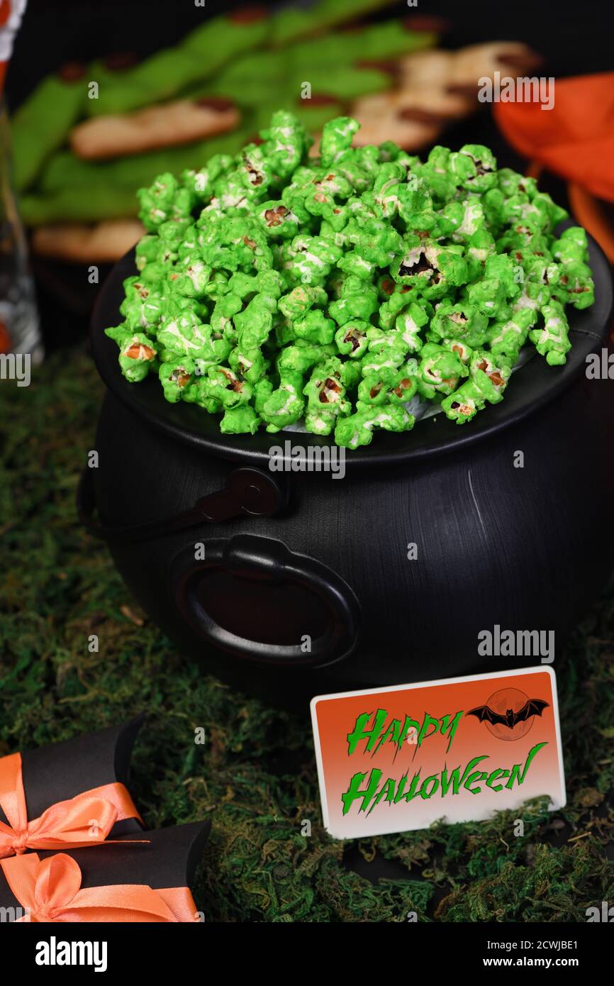 Cauldron green sweet popcorn for ghouls and zombies. Halloween treat ...