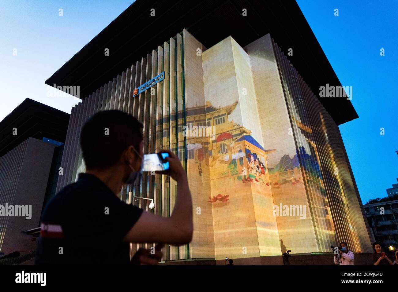 Chengdu, China's Sichuan Province. 29th Sep, 2020. A man takes photos ...