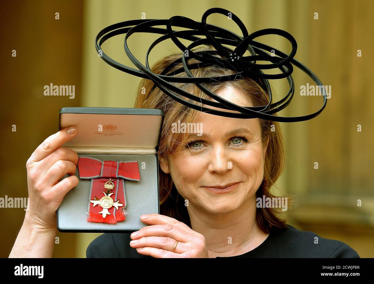 With his obe medal at buckingham palace hi-res stock photography and ...