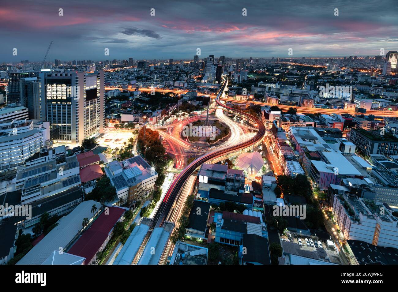 Cityscape of Victory Monument with car traffic on roundabout road in ...