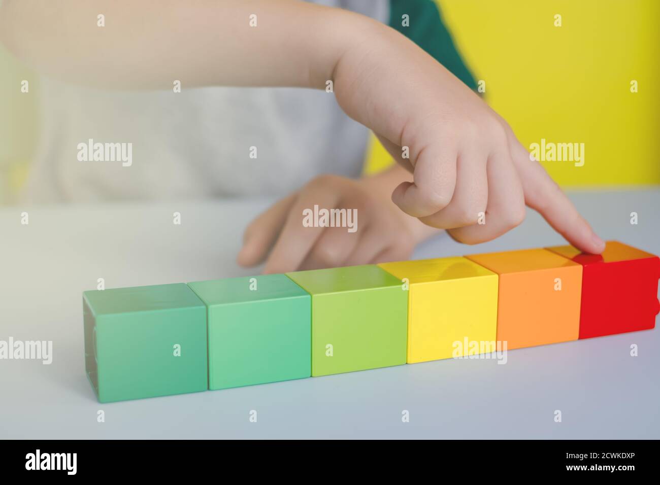 Child counting blocks hi-res stock photography and images - Alamy