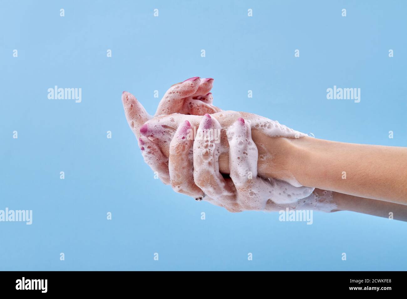 Young woman washing hands wash soapy hi-res stock photography and ...