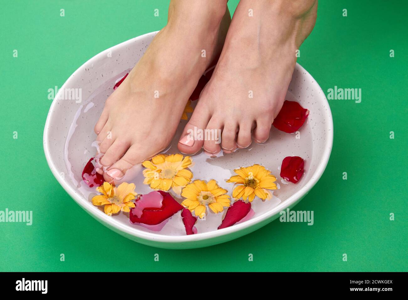 Woman's taking aroma feet bath Stock Photo - Alamy