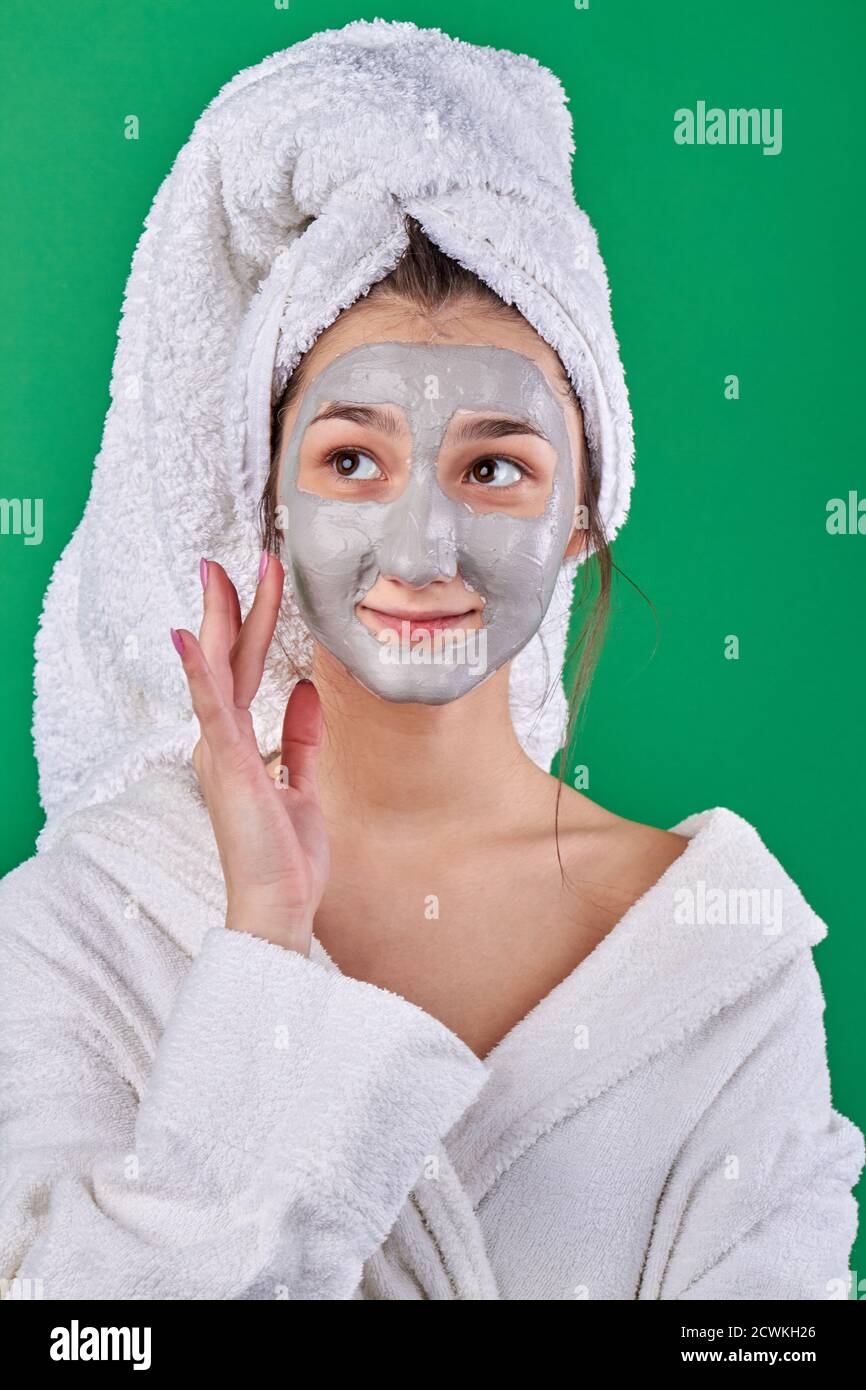 Portrait of young girl with skincare mask Stock Photo - Alamy