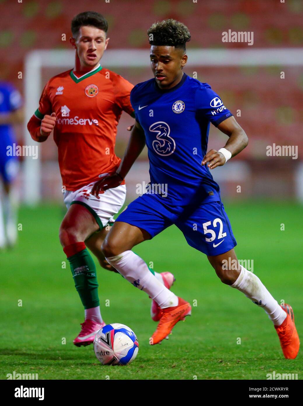 Ian Maatsen of Chelsea U21 is pursued by Rory Holden of Walsall during ...
