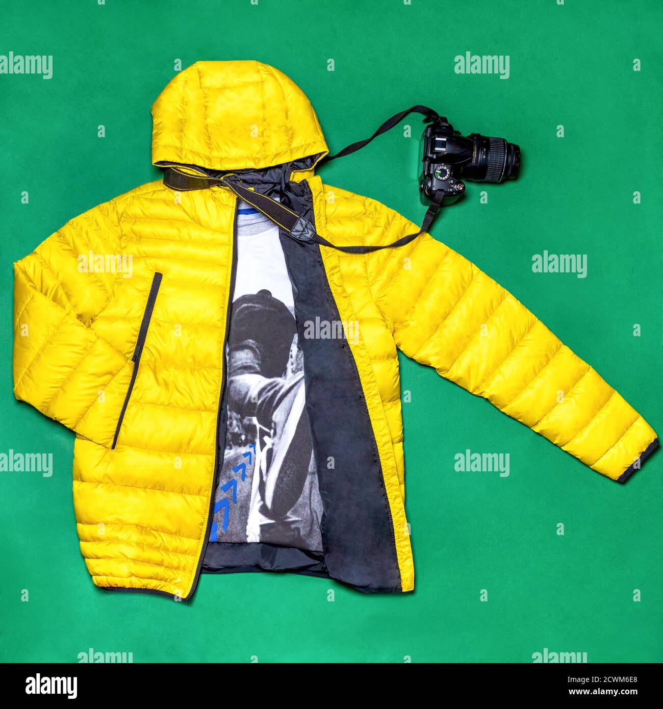Yellow man jacket with a camera decor isolated Stock Photo - Alamy