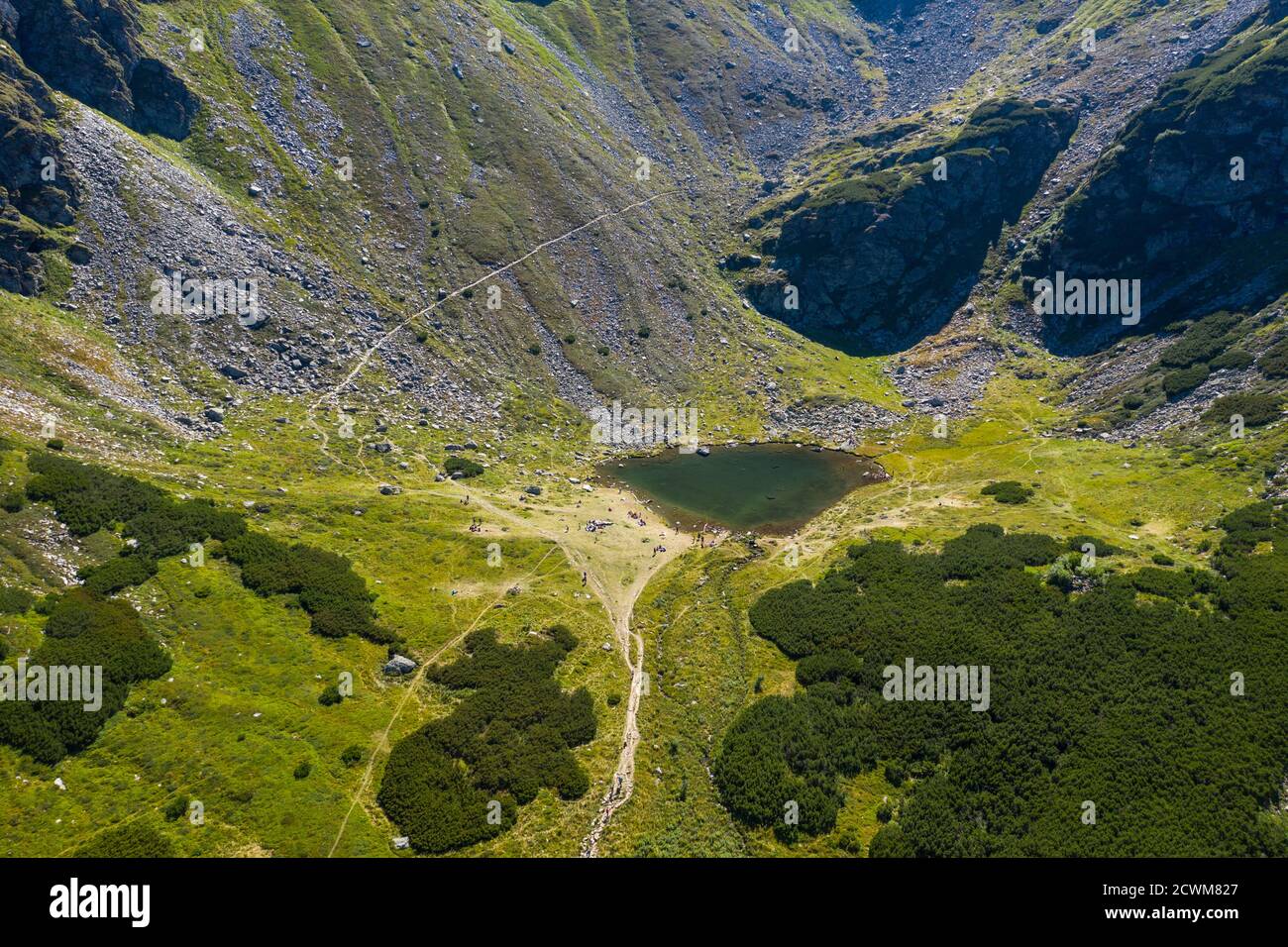 Aerial drone view of Iezer lake, Rodnei mountains, Eastern Carpathians ...