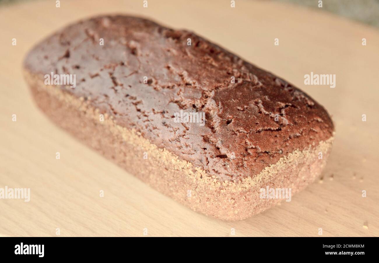 Homemade bread on a wooden desk Stock Photo - Alamy