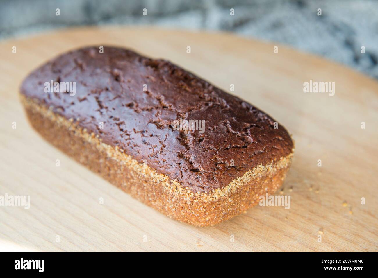 Homemade bread on a wooden desk Stock Photo - Alamy