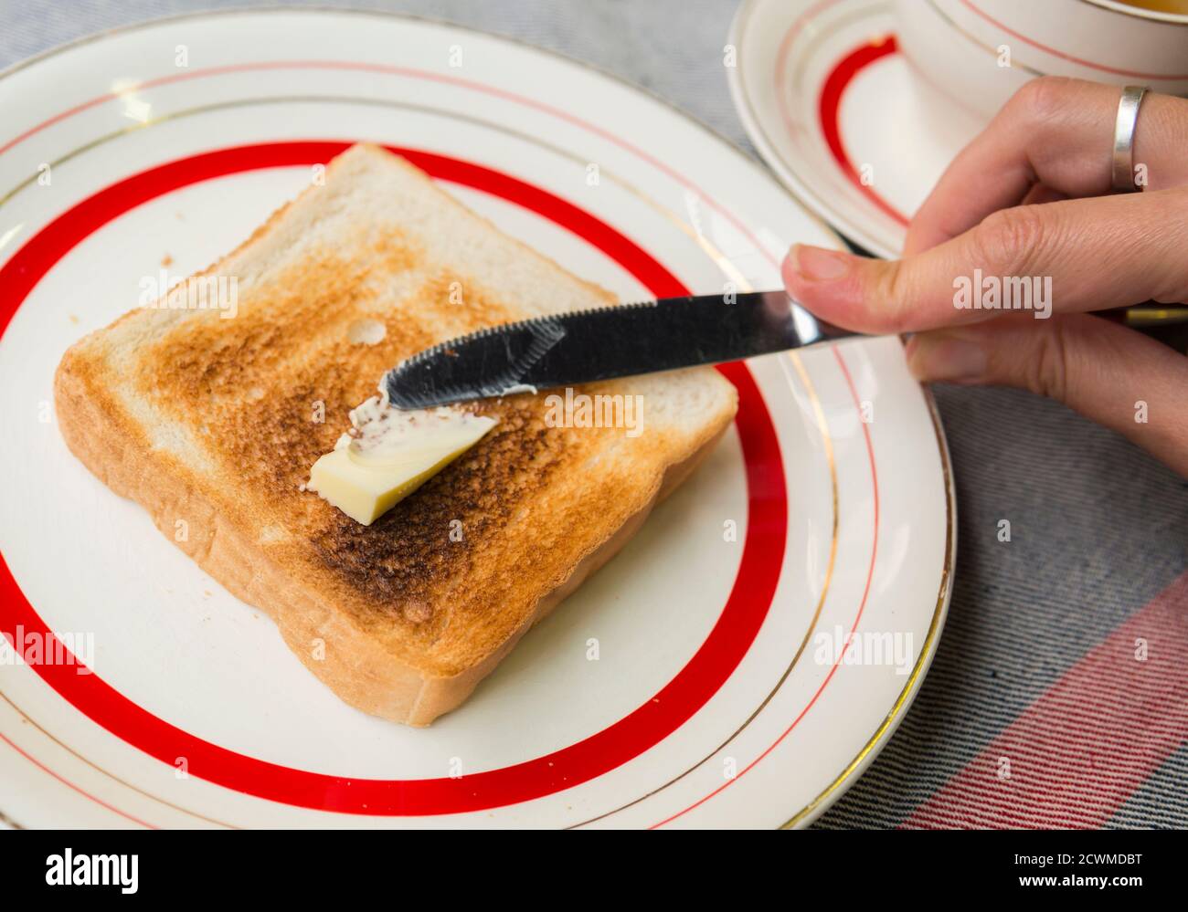 Toast with butter Stock Photo - Alamy
