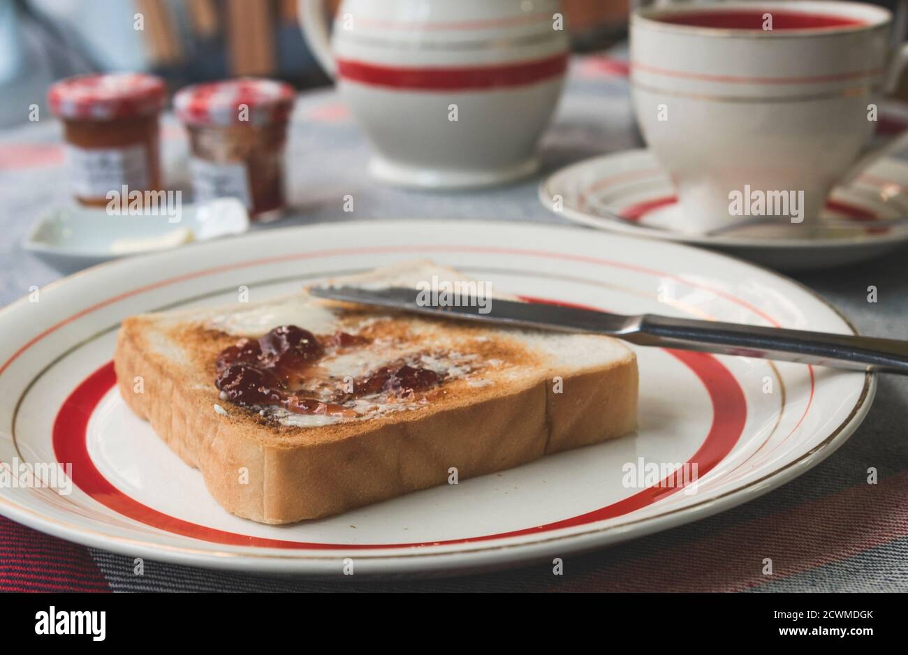 Cup of tea and Toast with butter and jam Stock Photo - Alamy