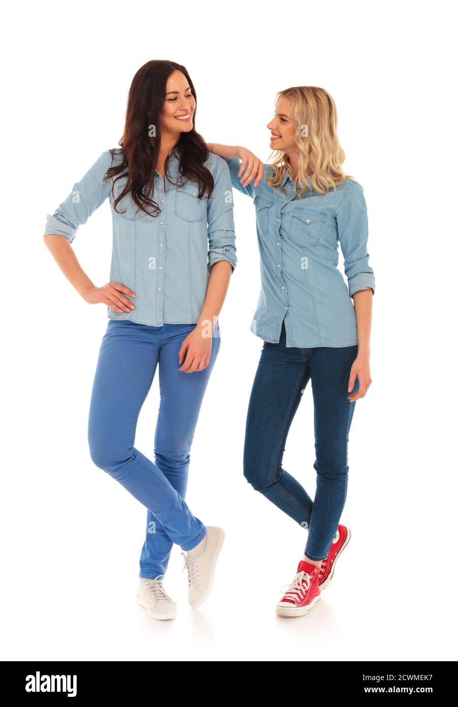 Women leaning on each other Cut Out Stock Images & Pictures - Alamy