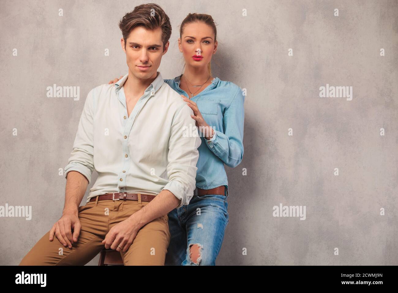 Seated couple embracing hi-res stock photography and images - Alamy