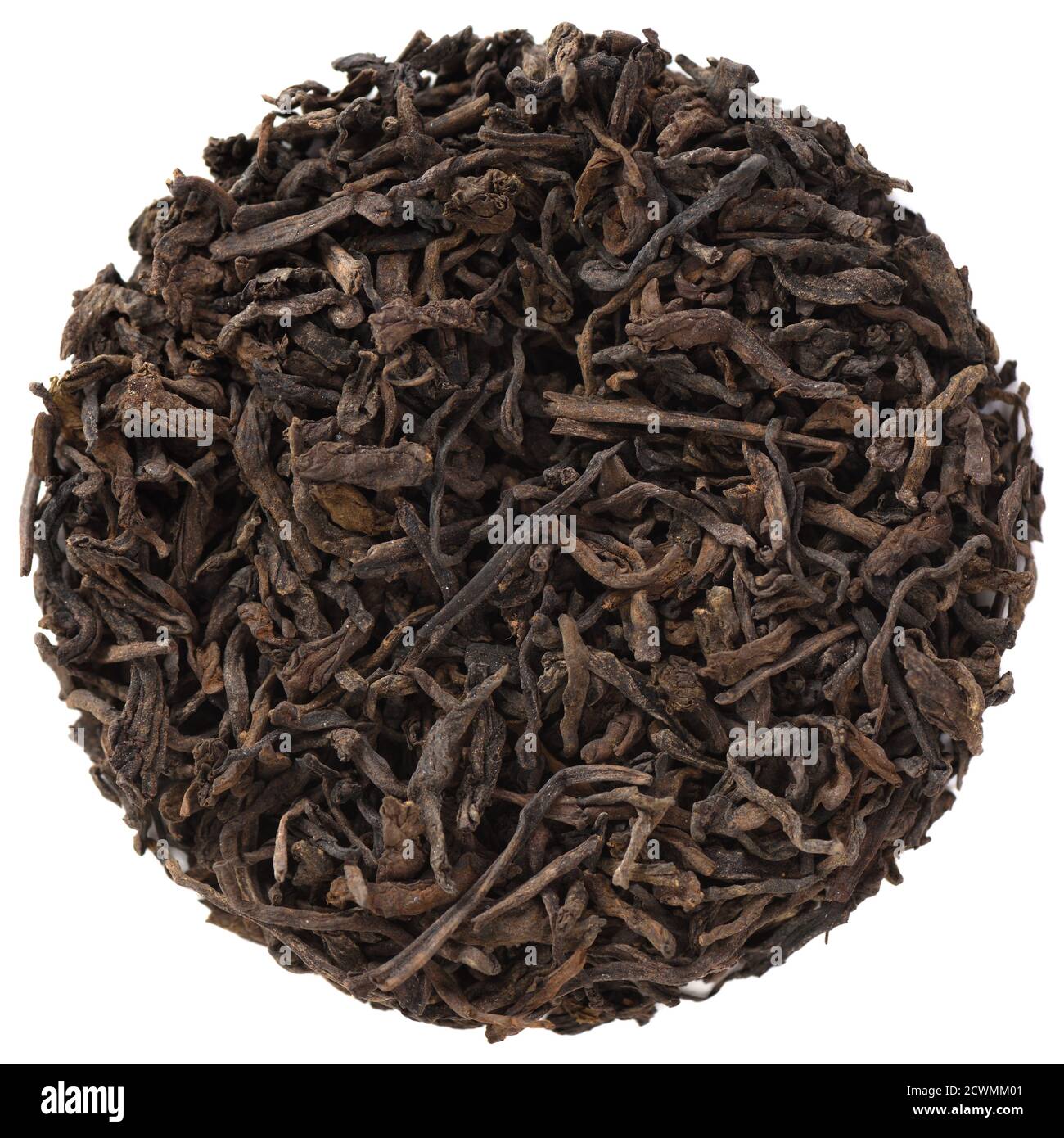 Loose leaf aged purple ripe ruerh tea in round shape isolated Stock ...