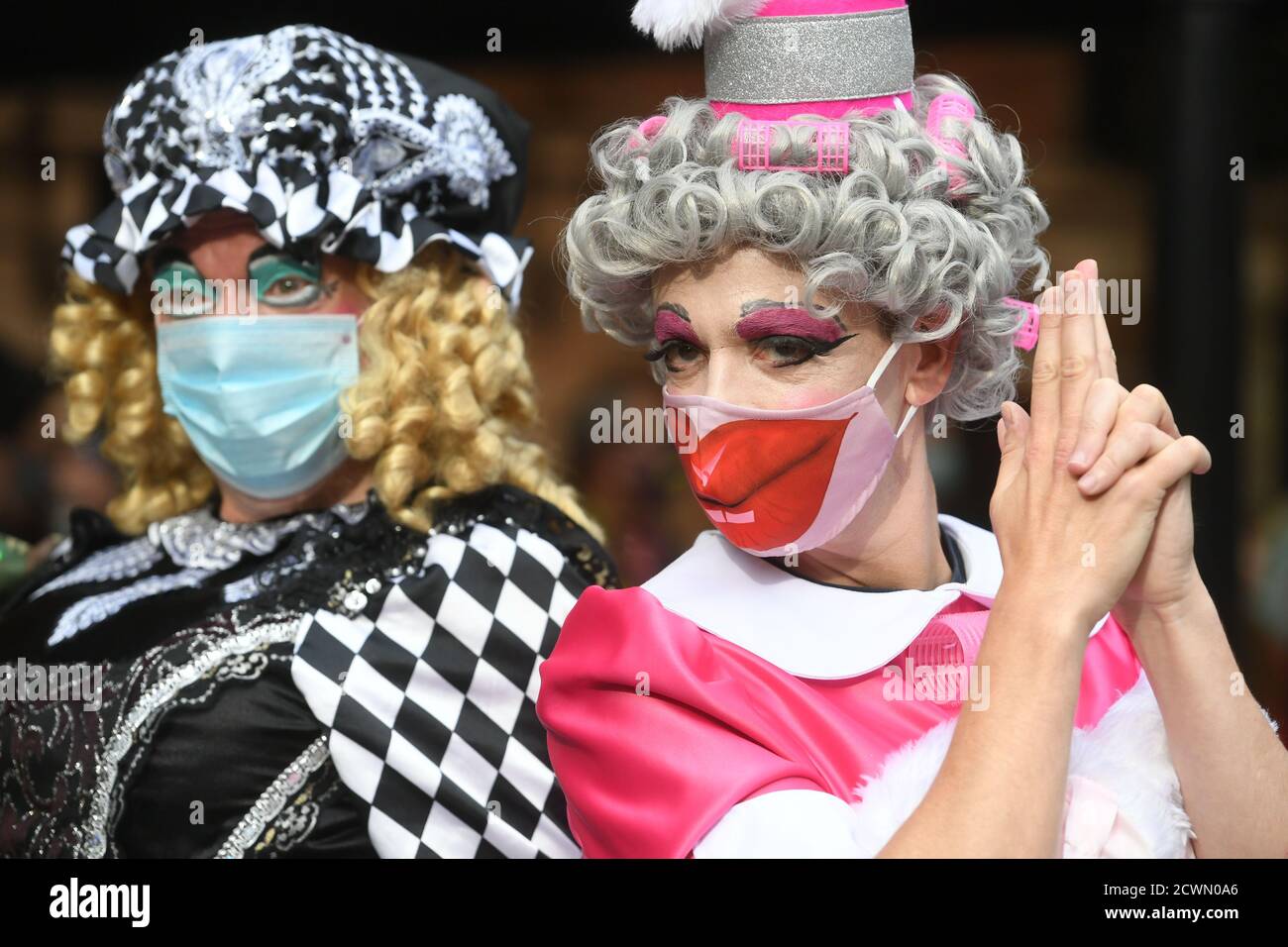 Pantomime dames make their way to parliament square hi-res stock ...
