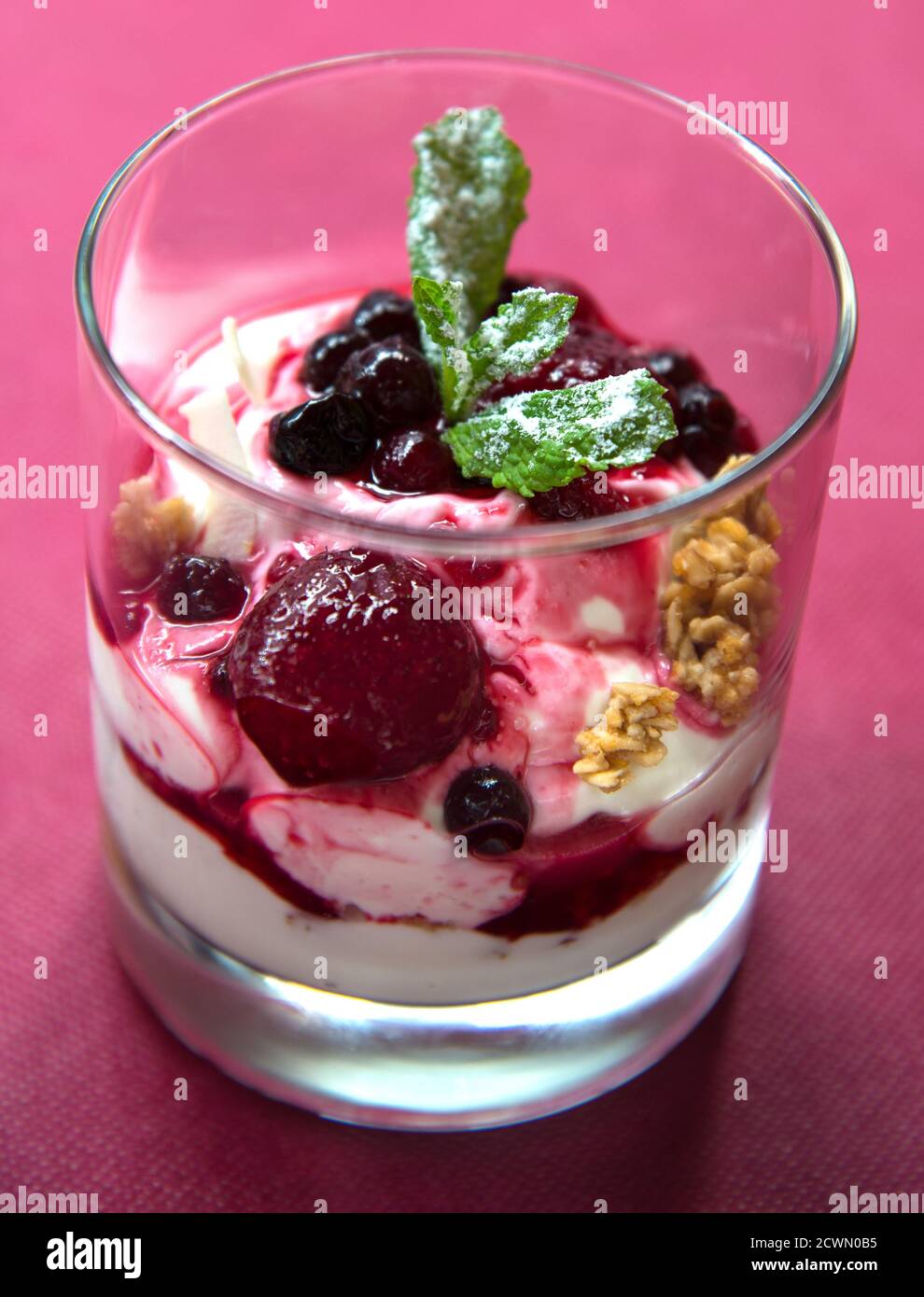 Greek yogurt with cereal and jam Stock Photo - Alamy