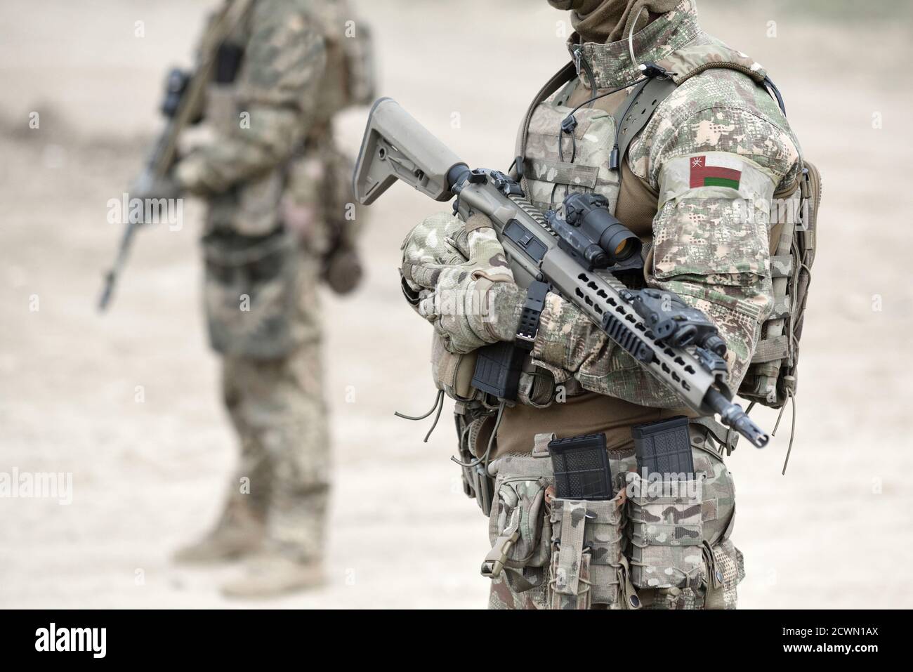 Soldiers with machine gun and flag of Oman on military uniform. Collage ...