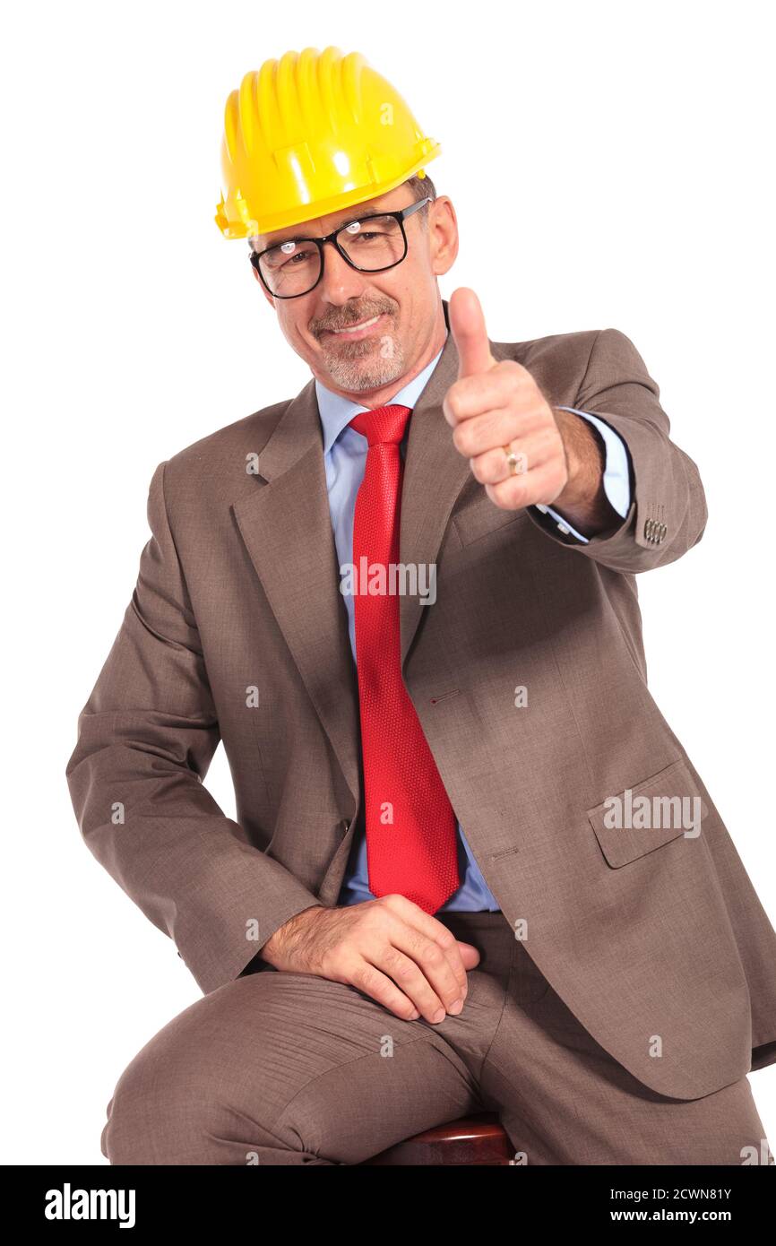 happy senior construction engineer making the ok thumbs up hand sign on ...