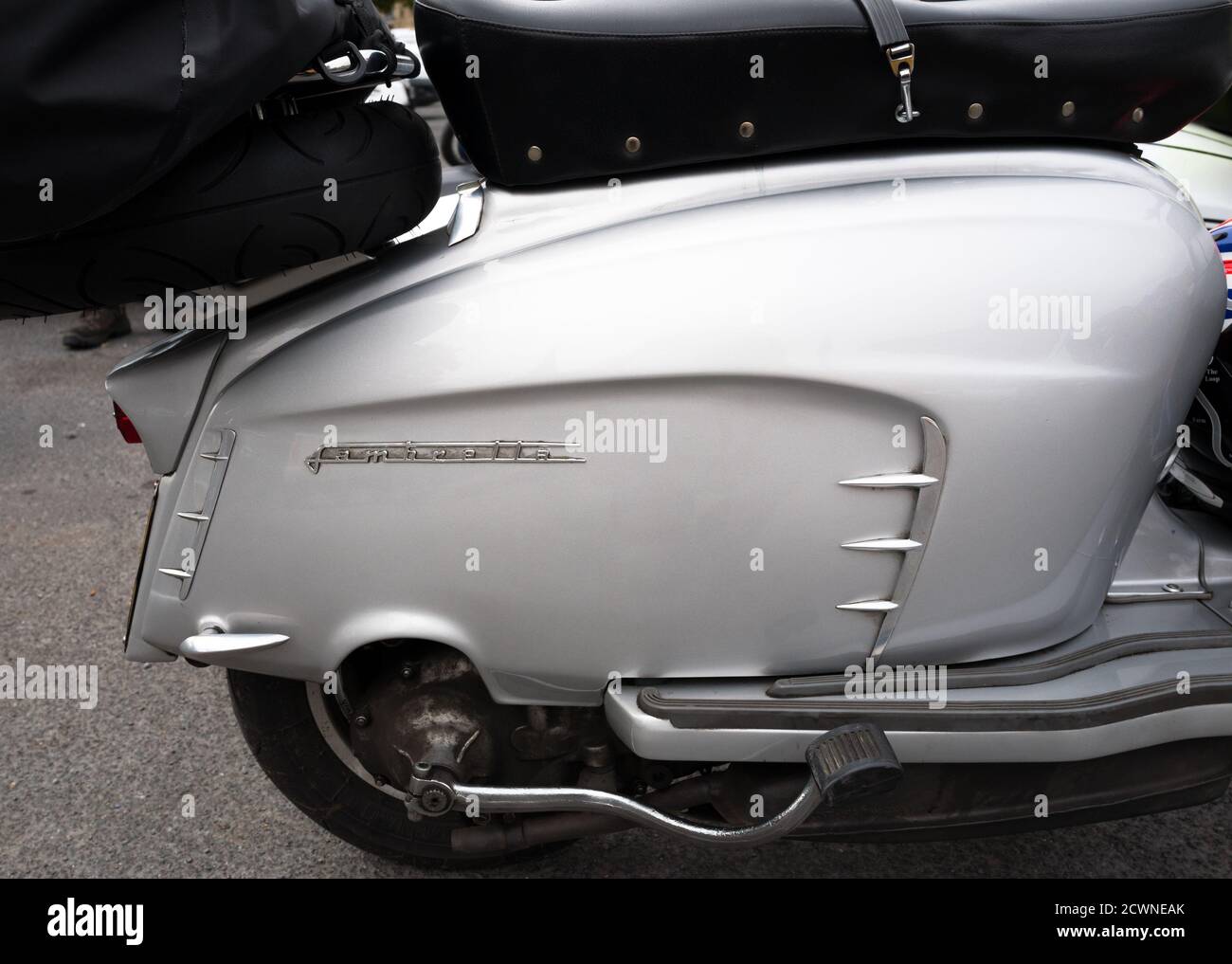 Silver painted rear side panel of a 60's Lambretta scooter Stock Photo ...