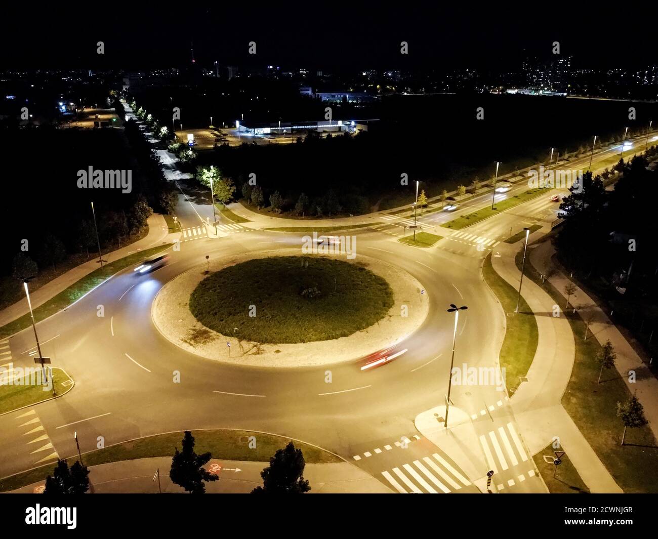 streets roundabout crossing at night drone top view Stock Photo - Alamy