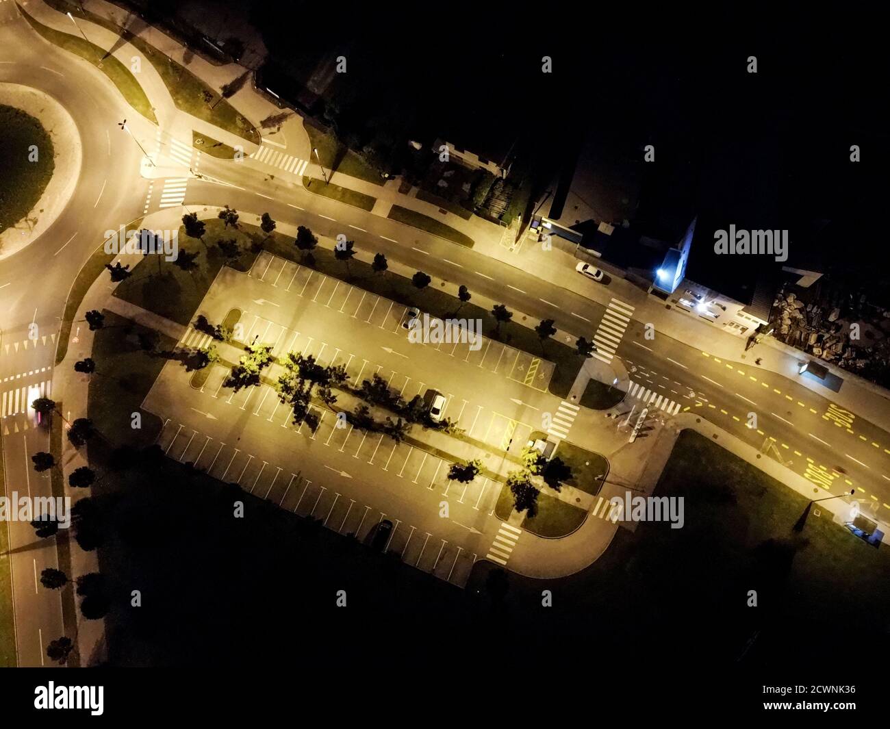 streets roundabout crossing at night drone top view Stock Photo - Alamy