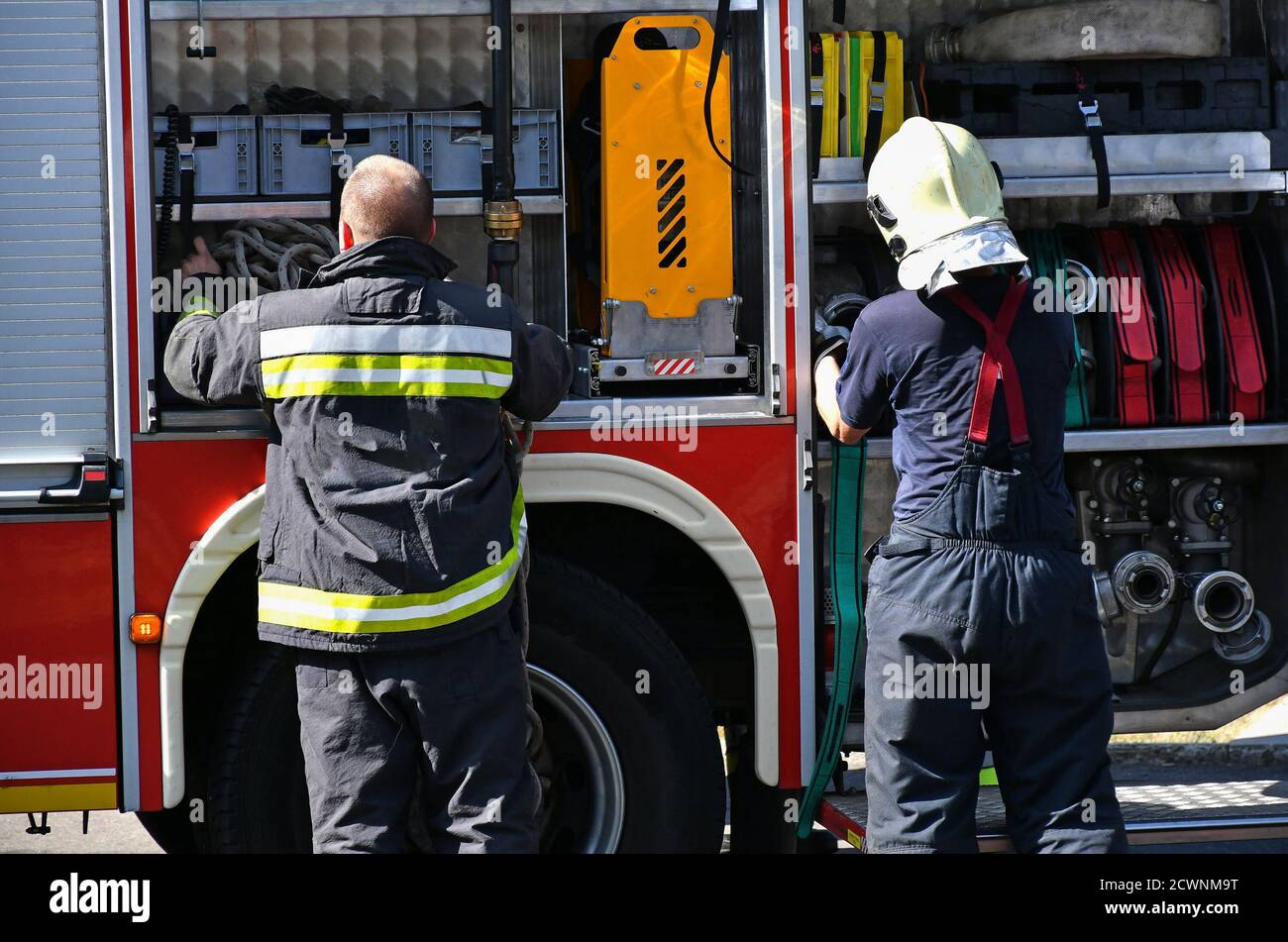 Firefighter at the scene of a fire Stock Photo - Alamy
