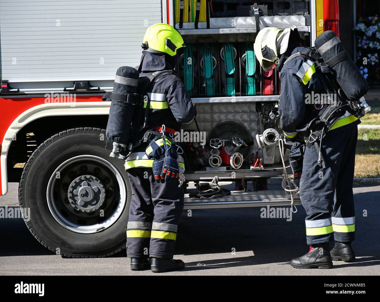 Firefighter at the scene of a fire Stock Photo - Alamy