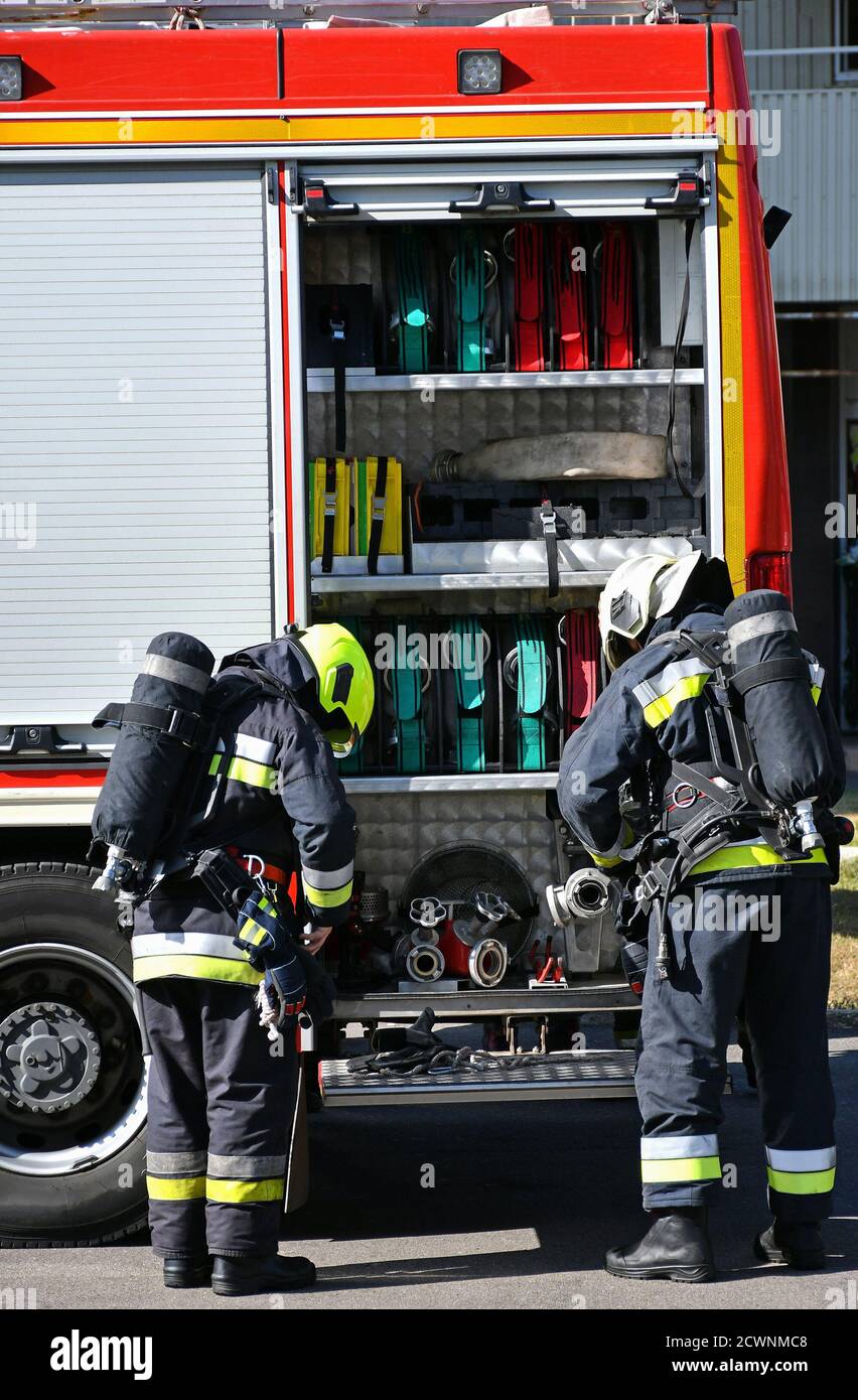 Firefighter at the scene of a fire Stock Photo - Alamy