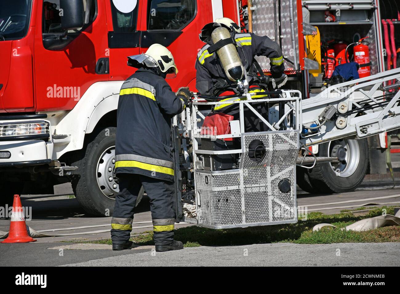 Firefighter at the scene of a fire Stock Photo - Alamy