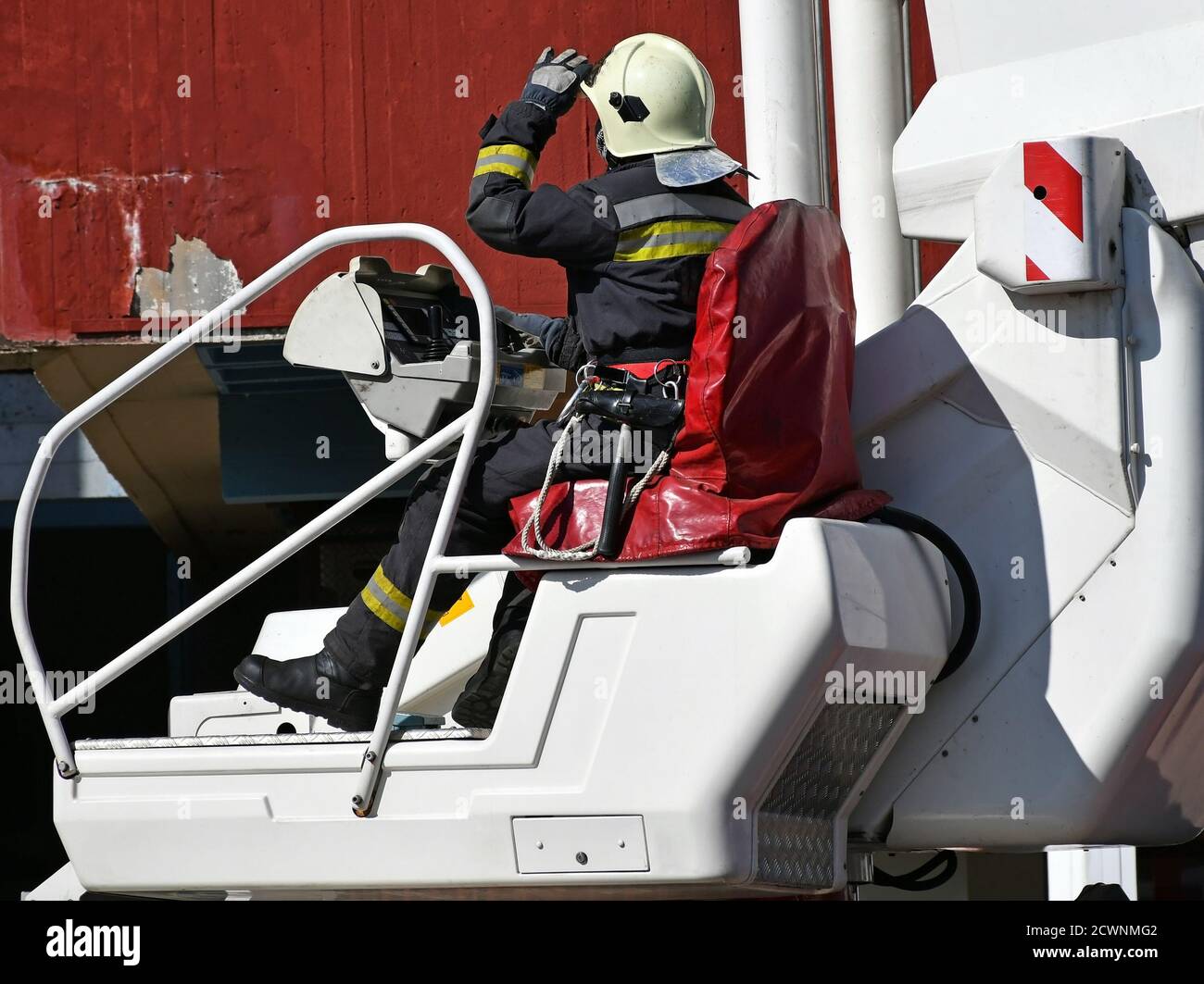 Firefighter at the scene of a fire Stock Photo - Alamy