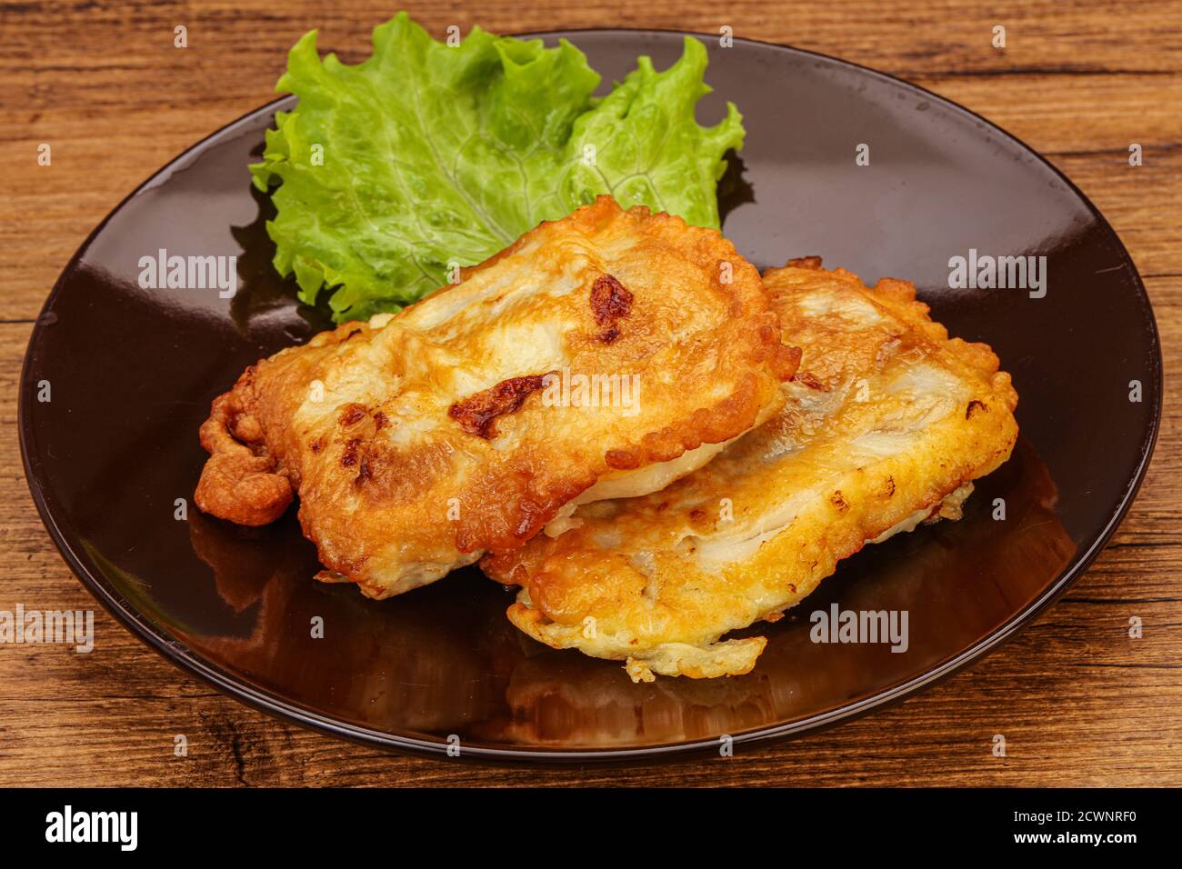 Roasted cod fish in the bread Stock Photo - Alamy