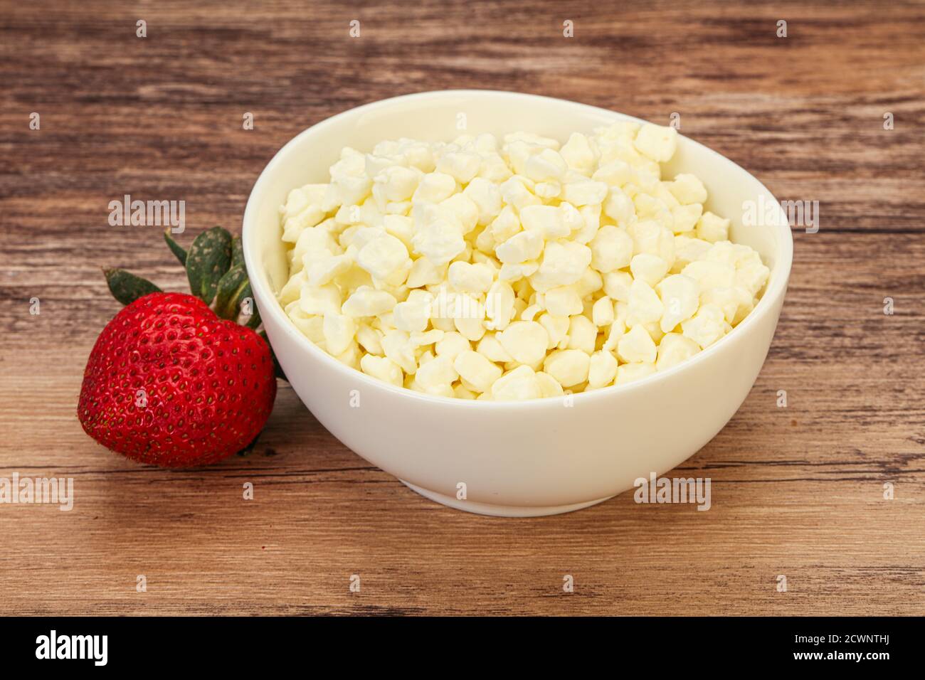 Dietary food - grain cottage cheese in the bowl Stock Photo - Alamy