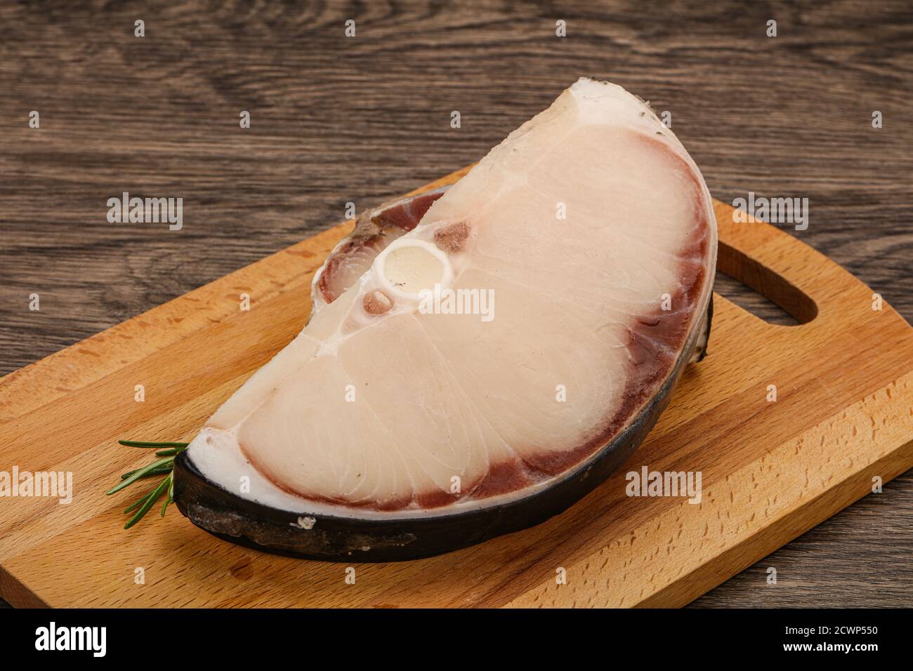 Raw shark steak served rosemary for cooking Stock Photo - Alamy