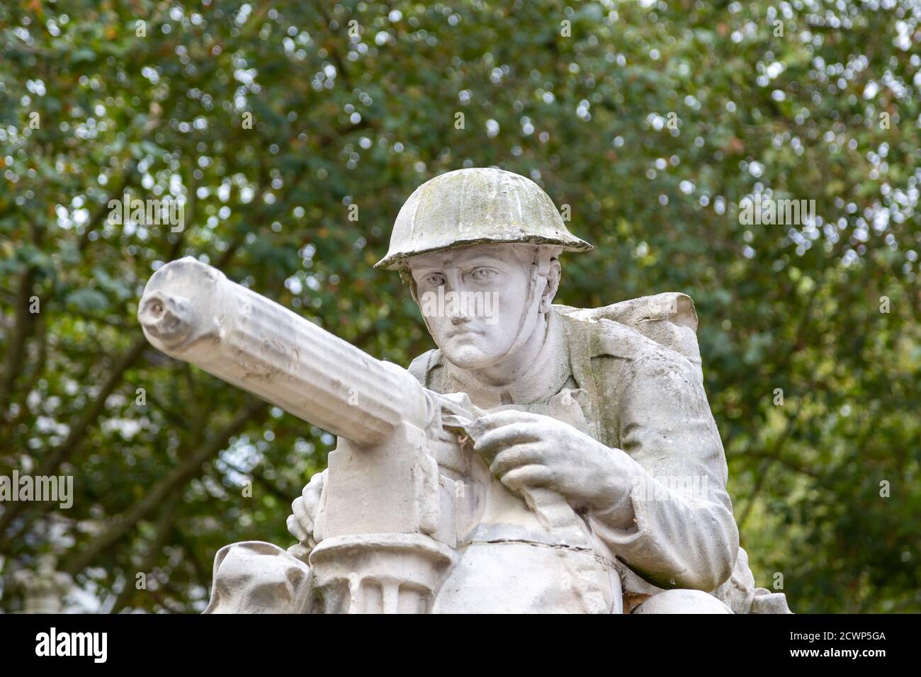 A close up of the statue of a world war two machine gunner, a part of a ...