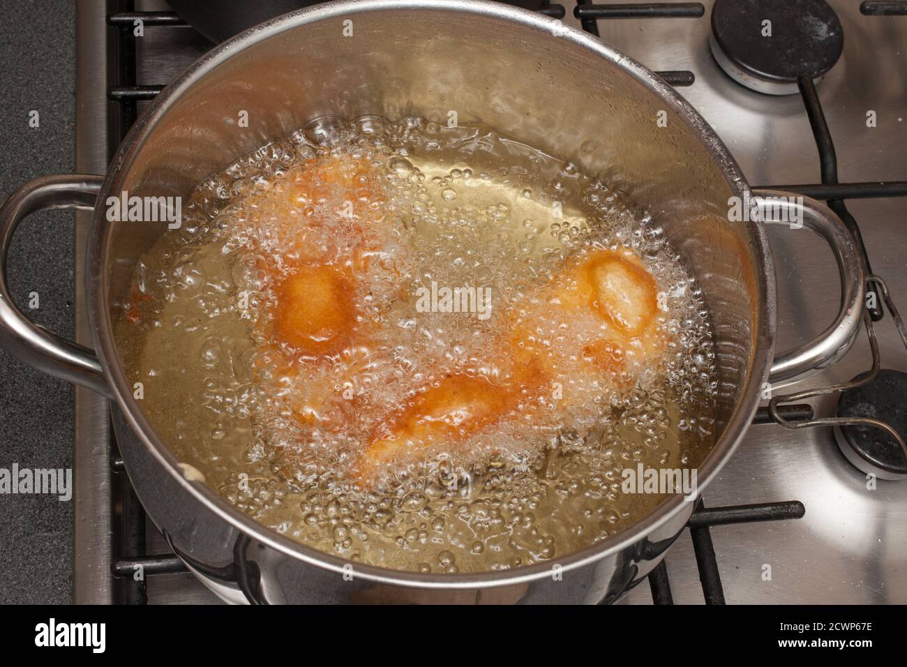 Deep frying hi-res stock photography and images - Alamy