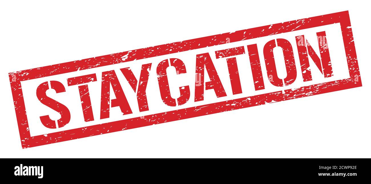 STAYCATION red grungy rectangle stamp sign Stock Photo - Alamy