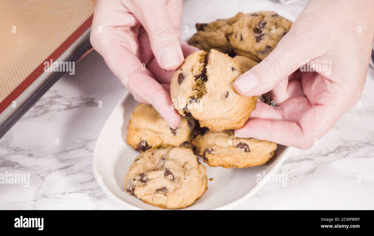 Step by step. Scooping homemade chocolate chip cookies with metal dough ...