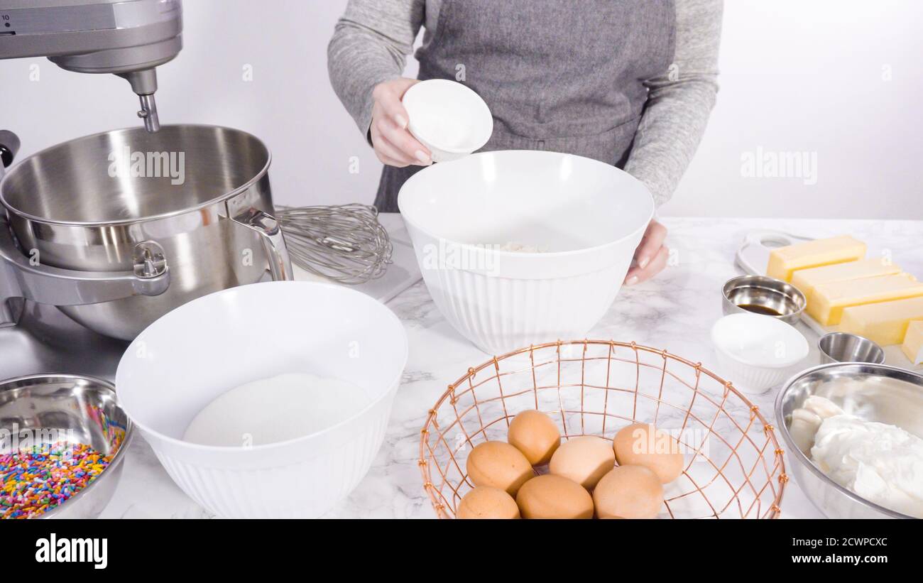 Mixing ingredients making funfetti cake hi-res stock photography and ...