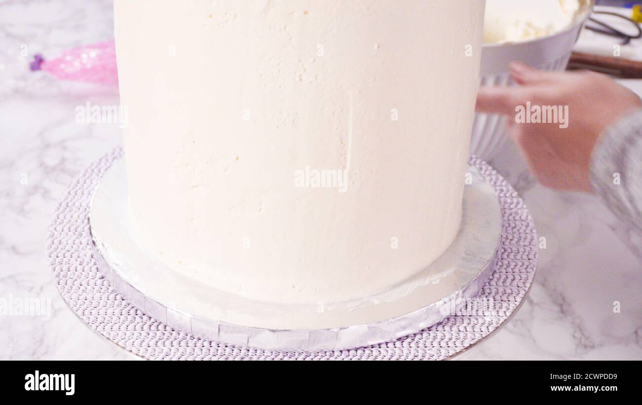 Step by step. Frosting round funfetti cake with white italian ...