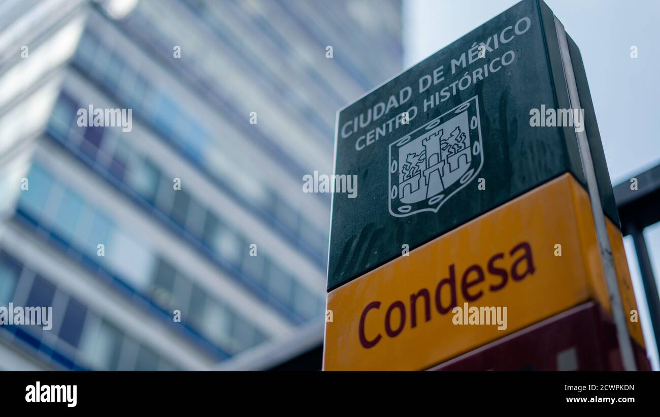 A Condesa Neighborhood Sign With the Latinamerican Tower in the Back ...