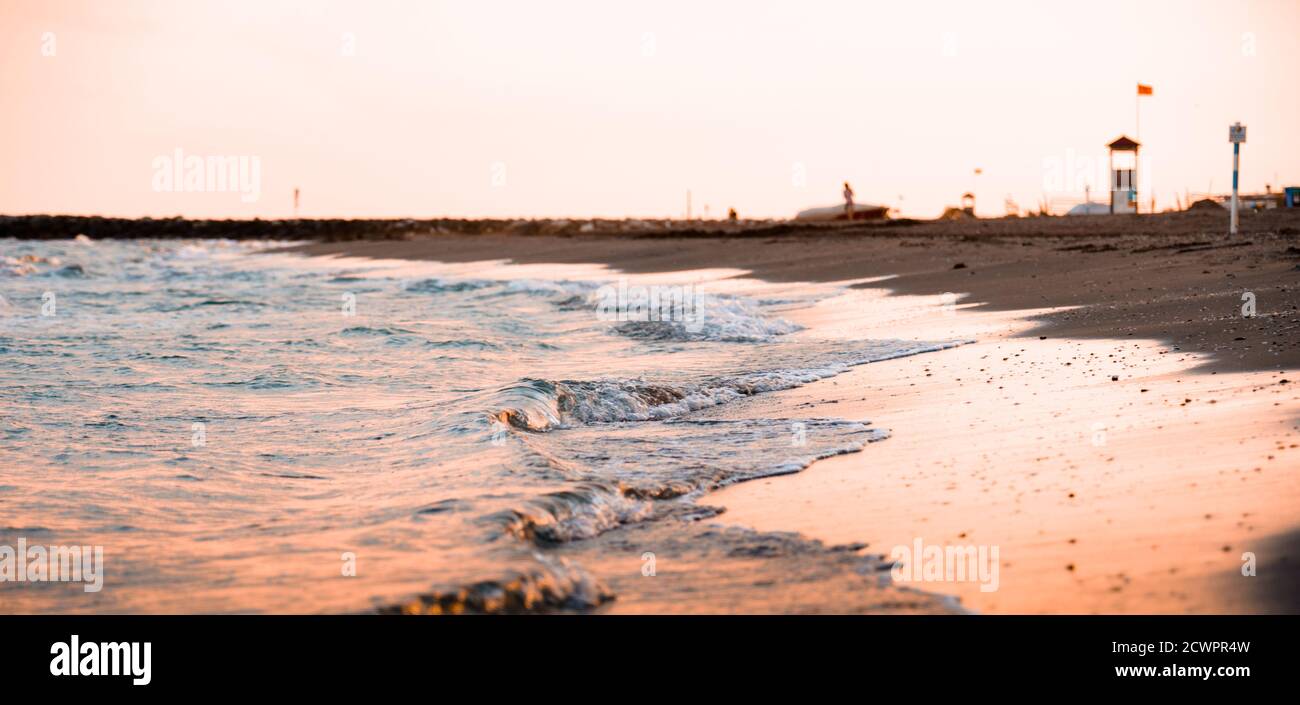 Sunset on beach waves breaking hi-res stock photography and images - Alamy
