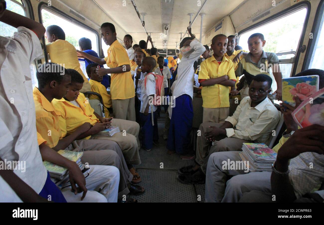 Pupils boarding school bus hi-res stock photography and images - Alamy