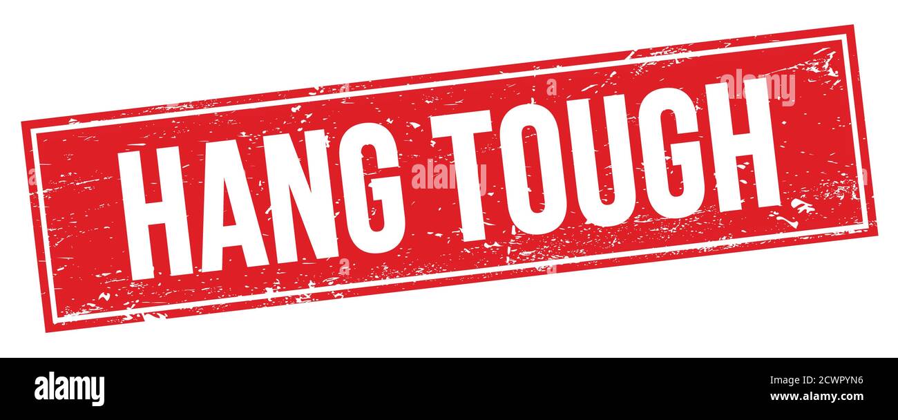 HANG TOUGH text on red grungy rectangle stamp sign Stock Photo - Alamy