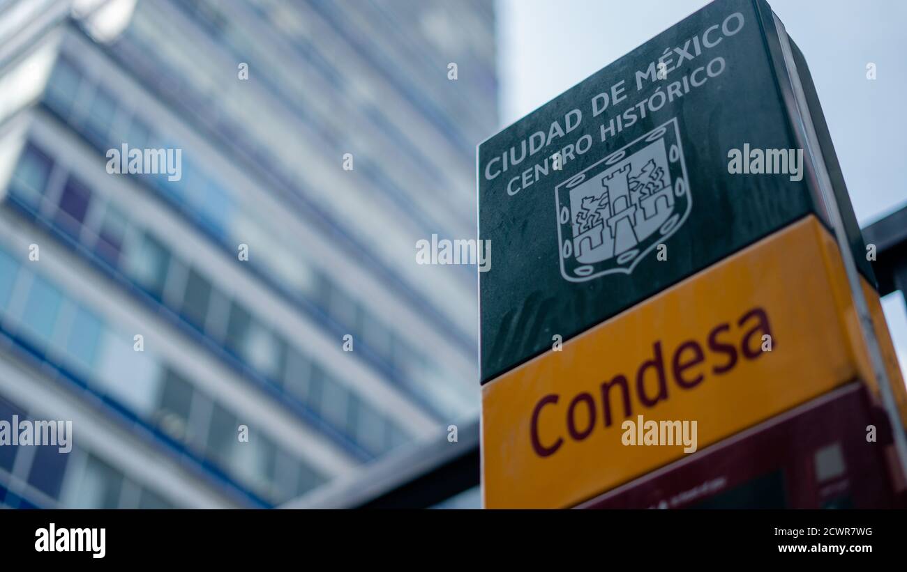 A Condesa Neighborhood Sign With the Latinamerican Tower in the Back ...