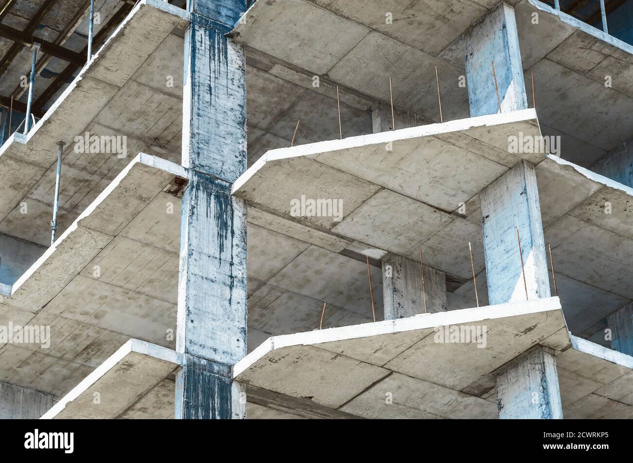 Construction of concrete apartment building. Gray frame of the building ...