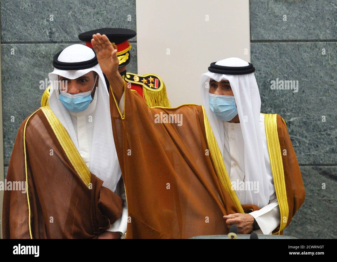 Kuwait City. 30th Sep, 2020. Sheikh Nawaf Al-Ahmad Al-Jaber Al-Sabah (R ...