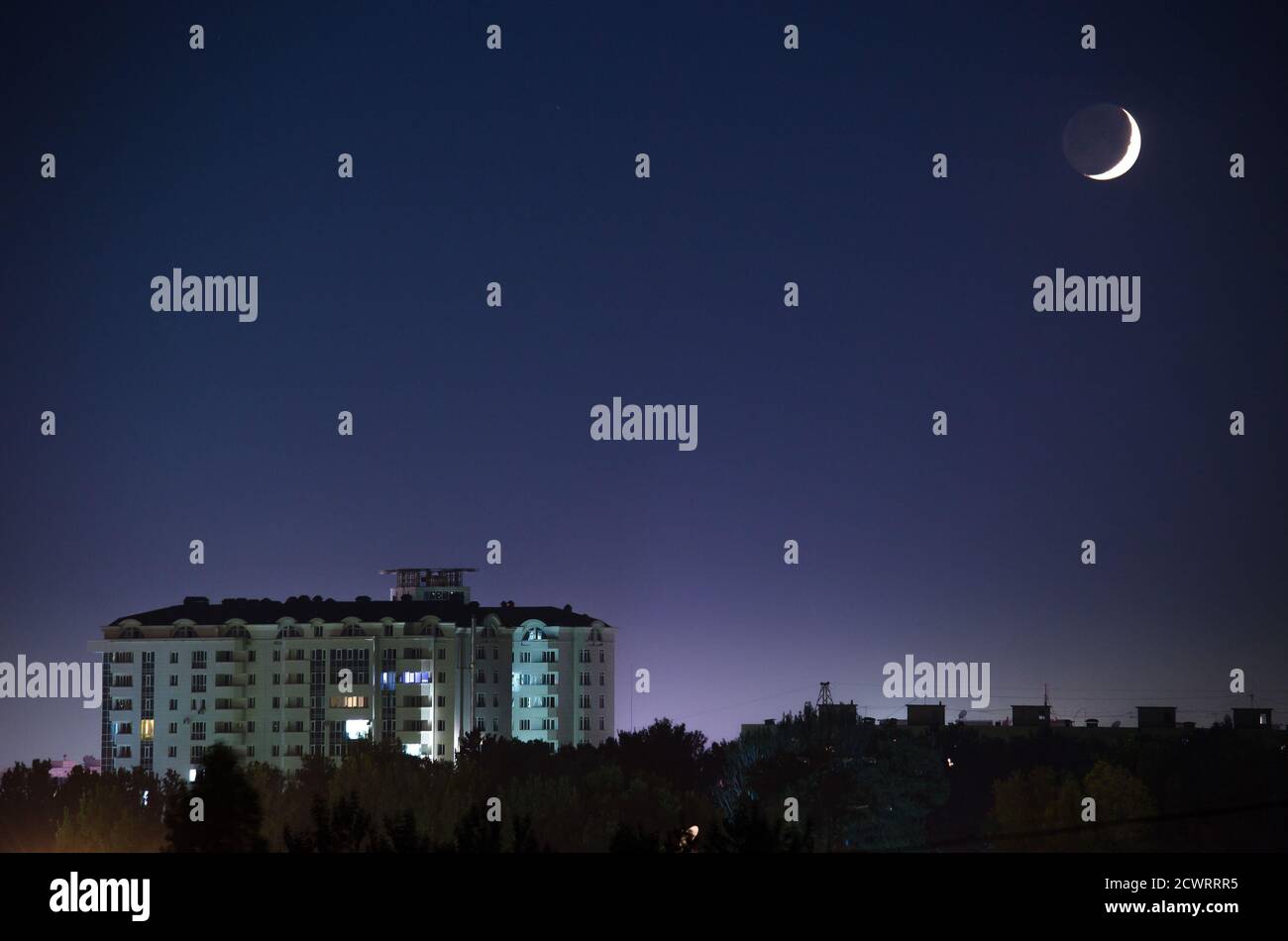Night landscape beautiful residential building with dark blue sky and ...