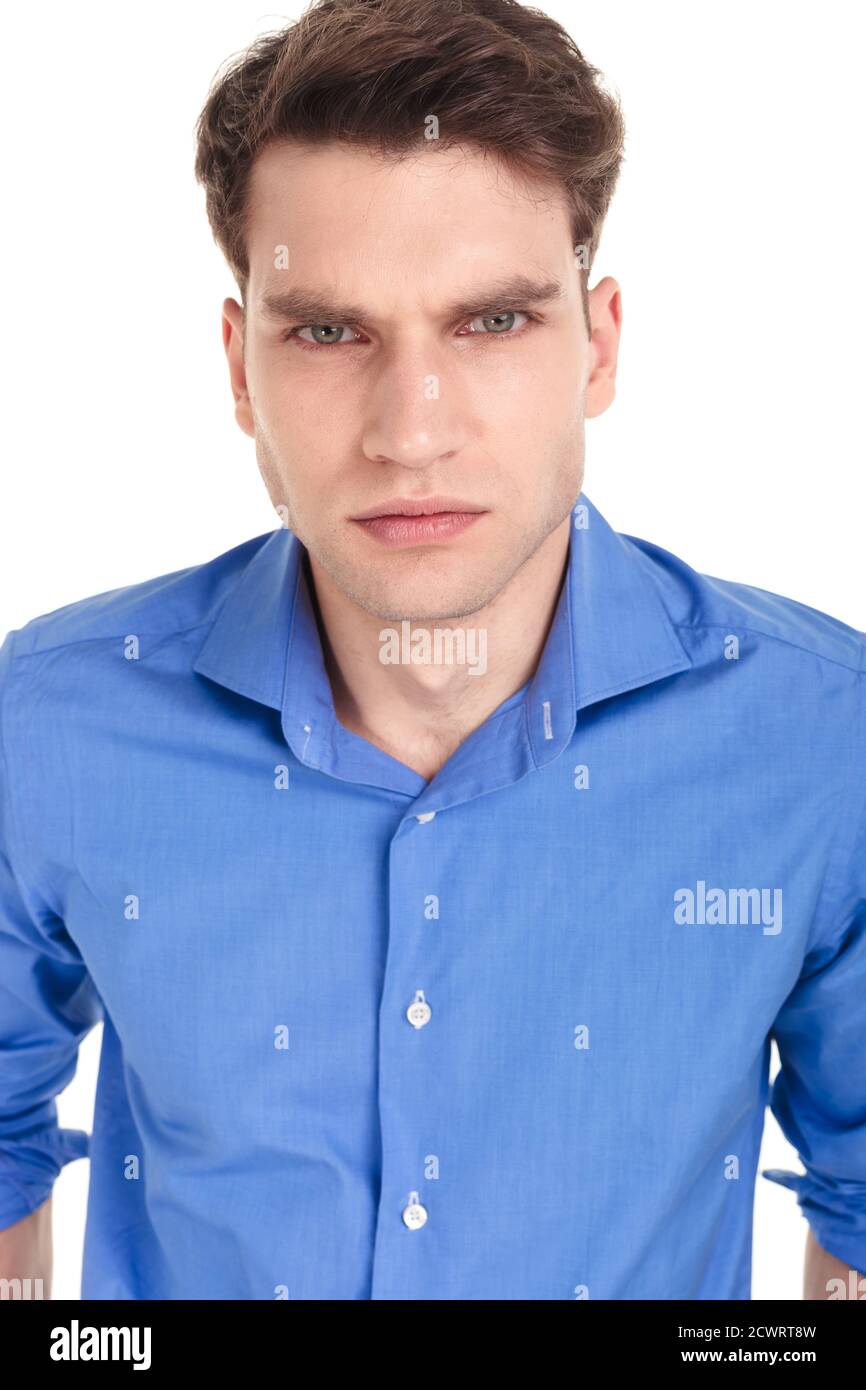 Close up picture of a young man looking angry at the camera Stock Photo ...