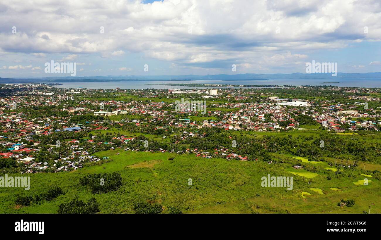 Tacloban, aerial view. Town and sky with cumulus clouds. Leyte Island ...